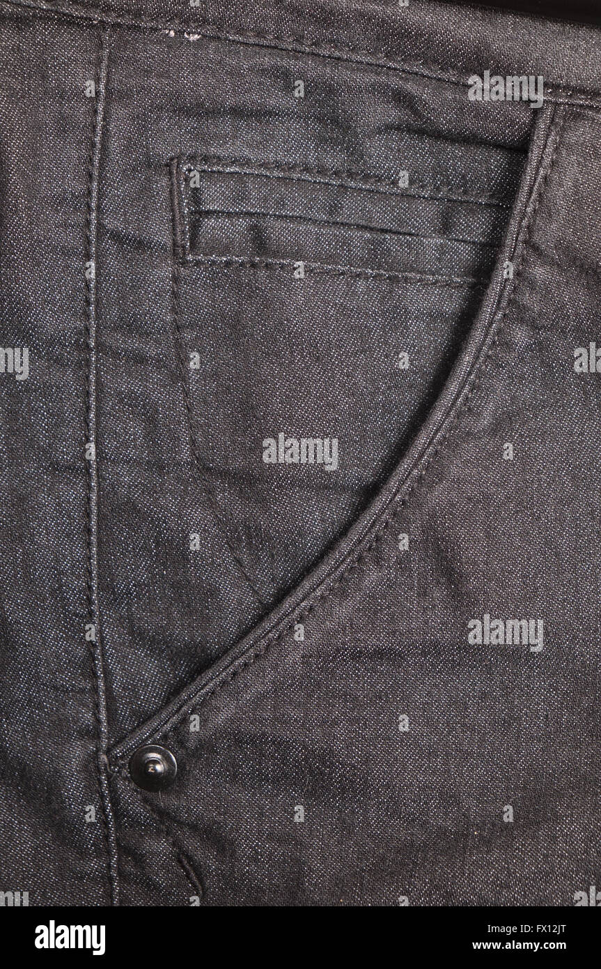 Black denim fabric, pocket close up detail. Fashion, textures and ...