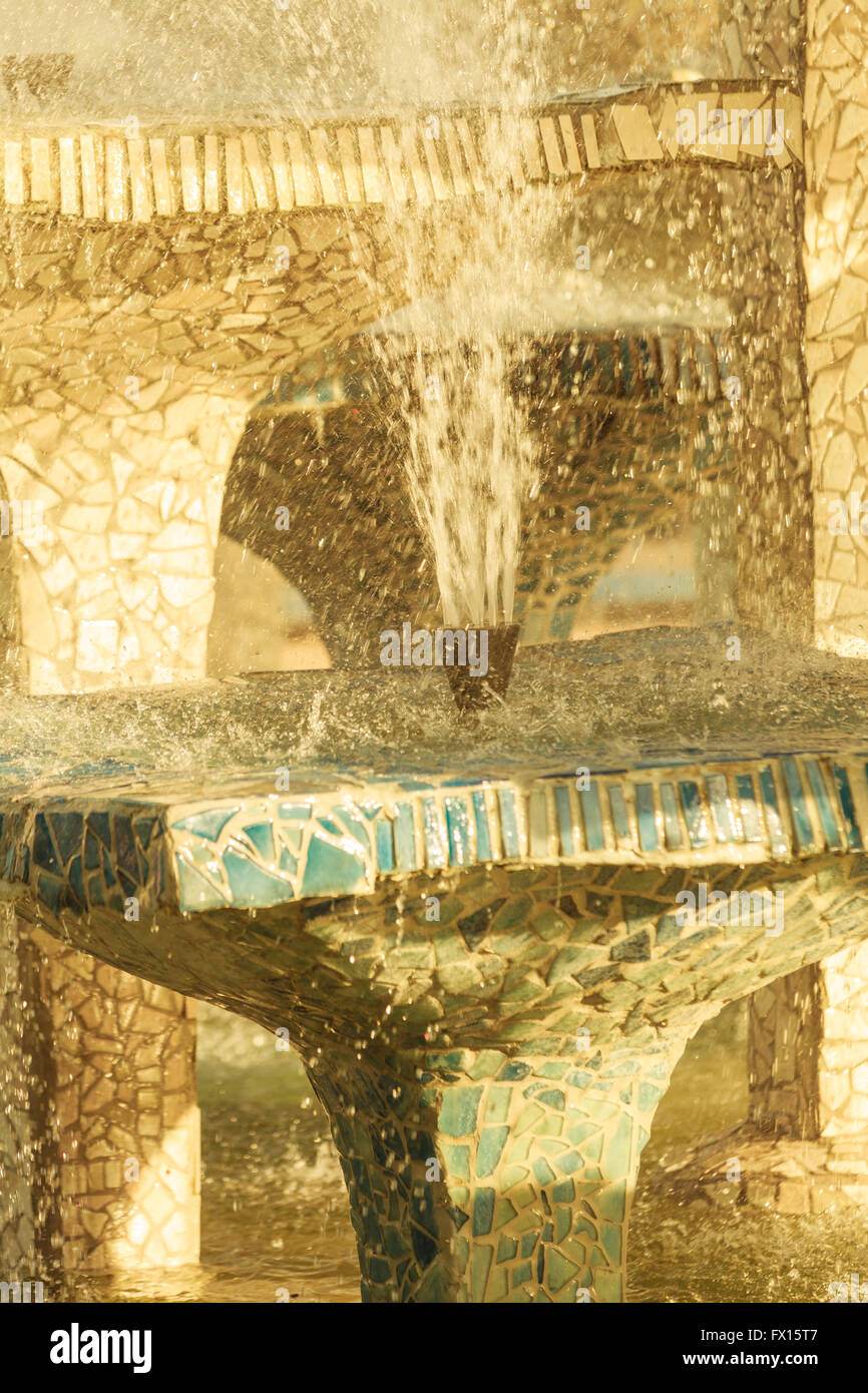 Closeup of stone fountain with dripping water at sunset Stock Photo - Alamy