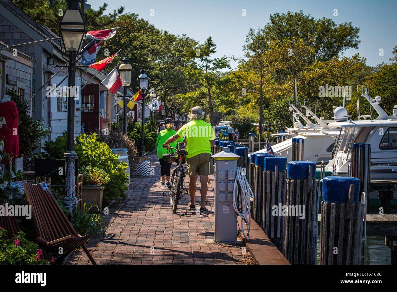 Boats dock people provincetown wharf hi-res stock photography and ...