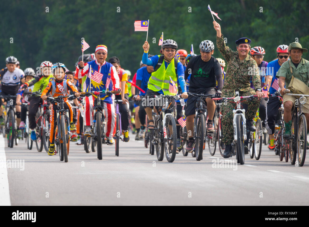 Bicycle ride during National Day celebration Stock Photo - Alamy