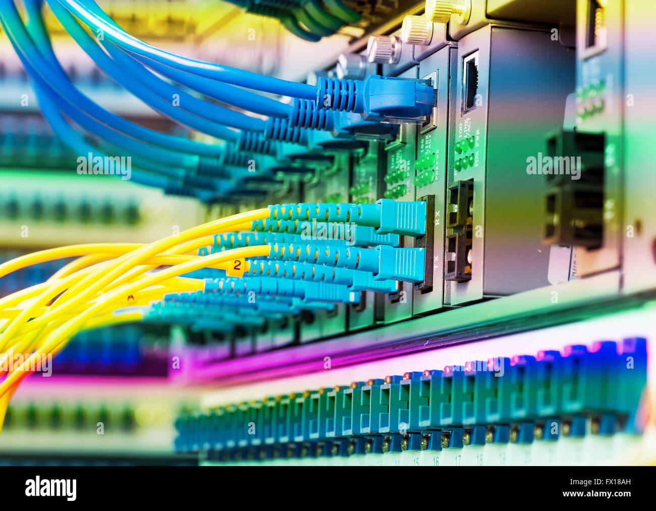 Fiber optic connecting on core network swtich Stock Photo - Alamy