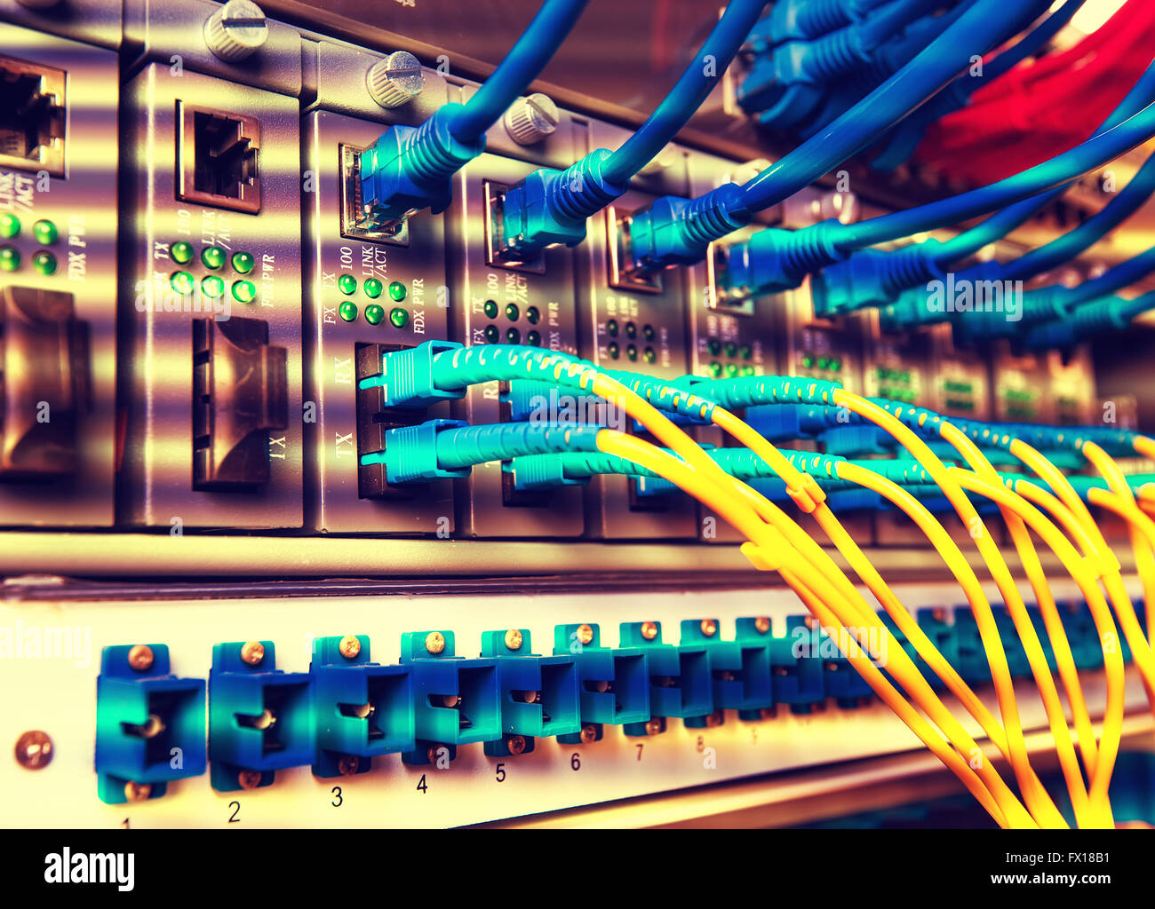Fiber optic connecting on core network swtich Stock Photo - Alamy