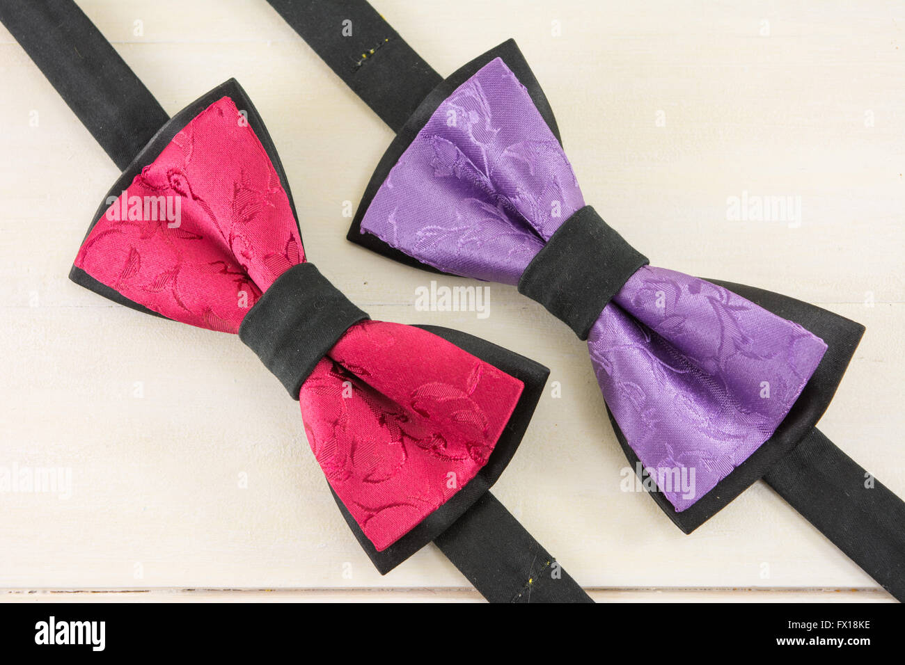 Bow ties on a wooden table Stock Photo - Alamy