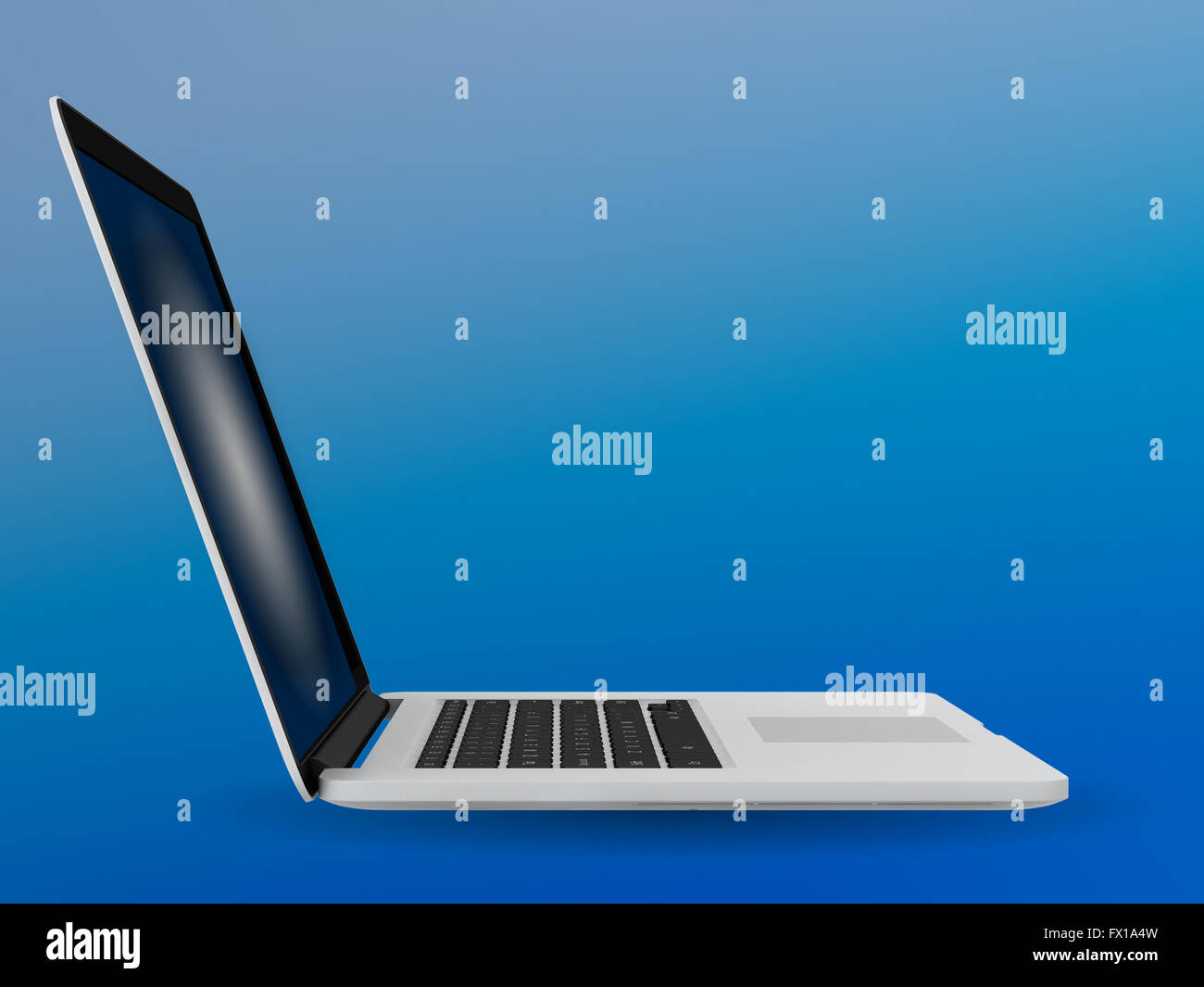 The laptop on a blue background close-up Stock Photo - Alamy