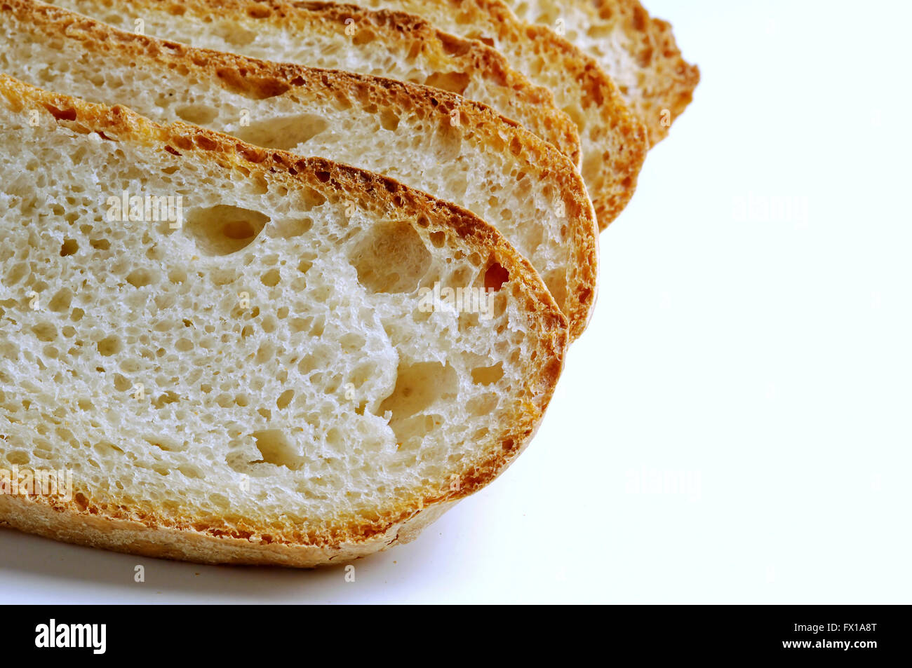 Sliced bread closeup with copy space Stock Photo - Alamy