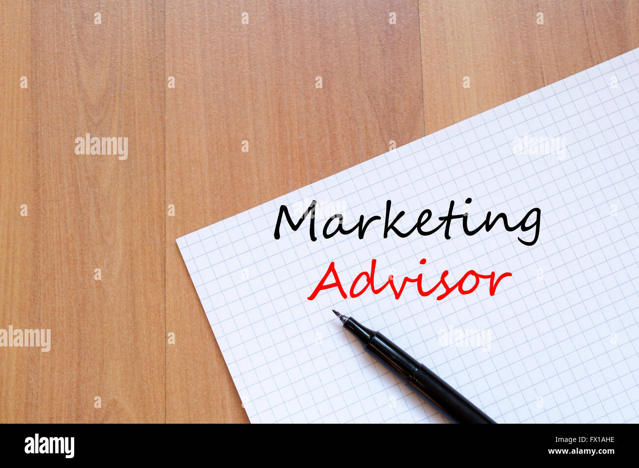 Marketing advisor text concept write on notebook Stock Photo - Alamy