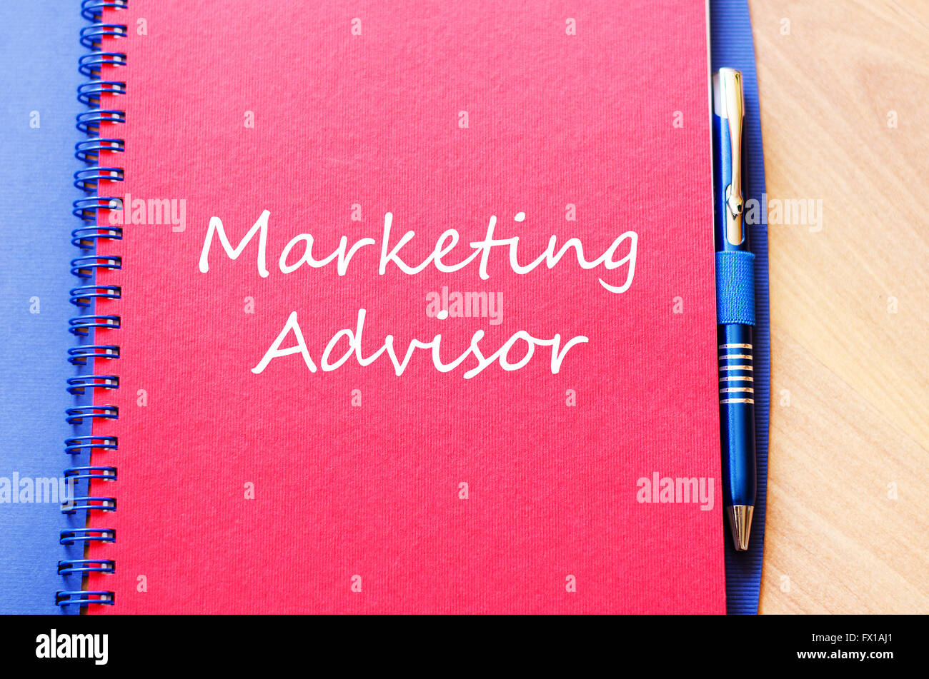 Marketing advisor text concept write on notebook Stock Photo - Alamy
