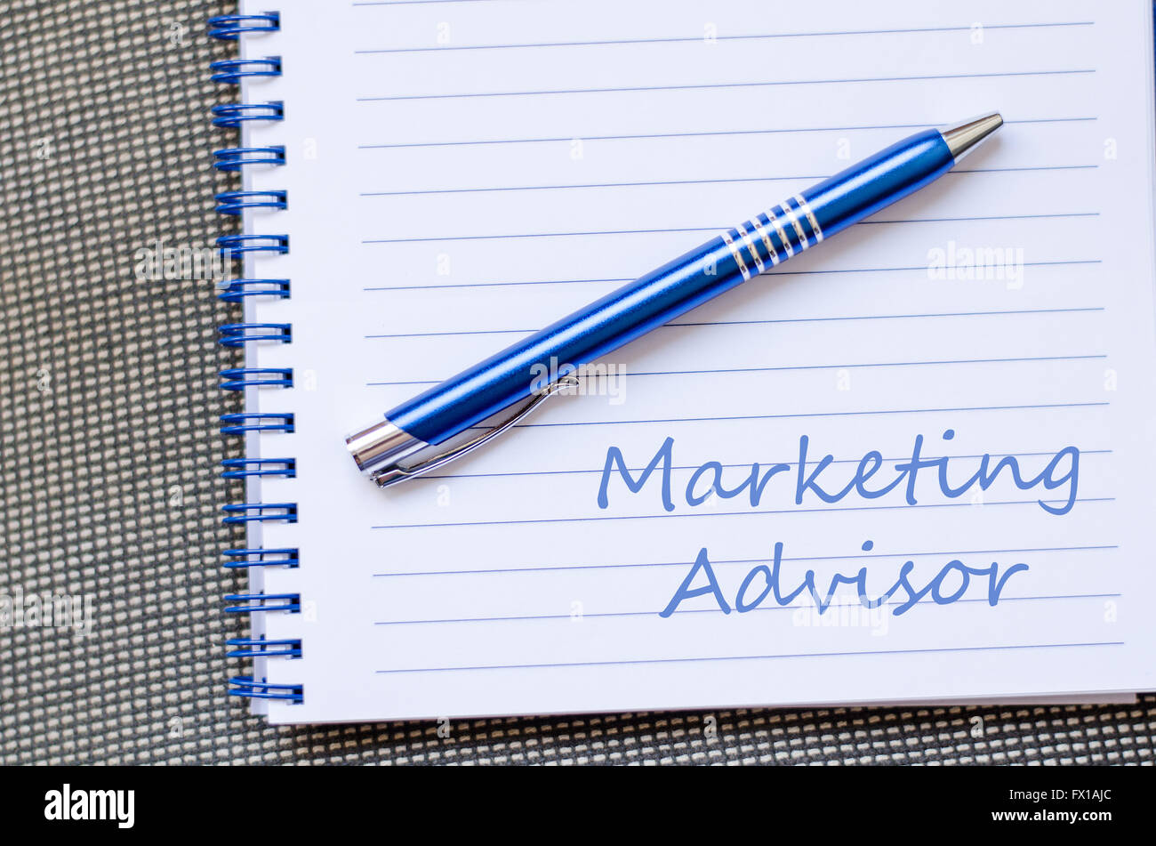 Marketing advisor text concept write on notebook Stock Photo - Alamy