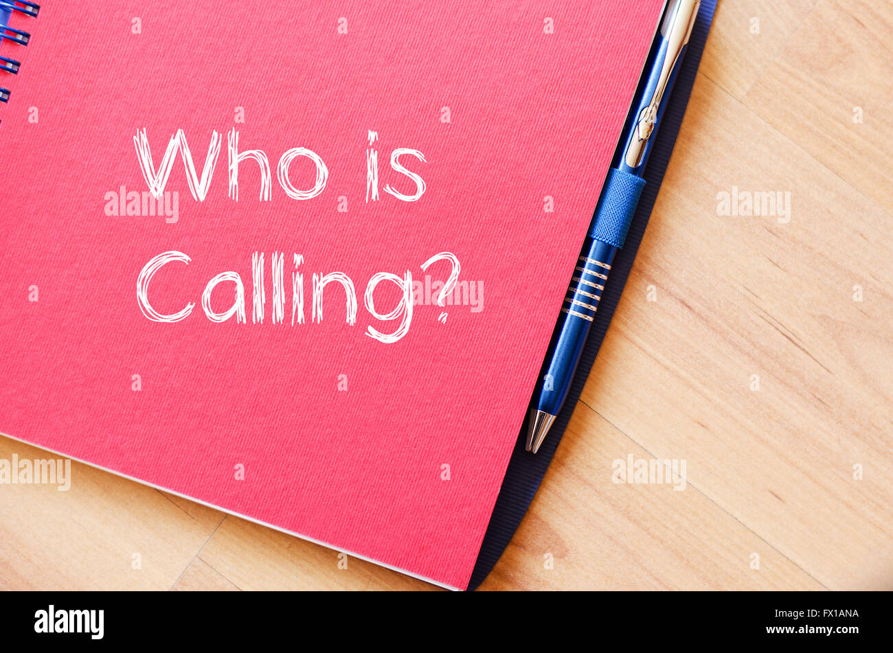 Who is calling text concept write on notebook Stock Photo - Alamy