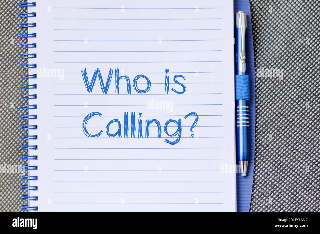 Who is calling text concept write on notebook Stock Photo - Alamy