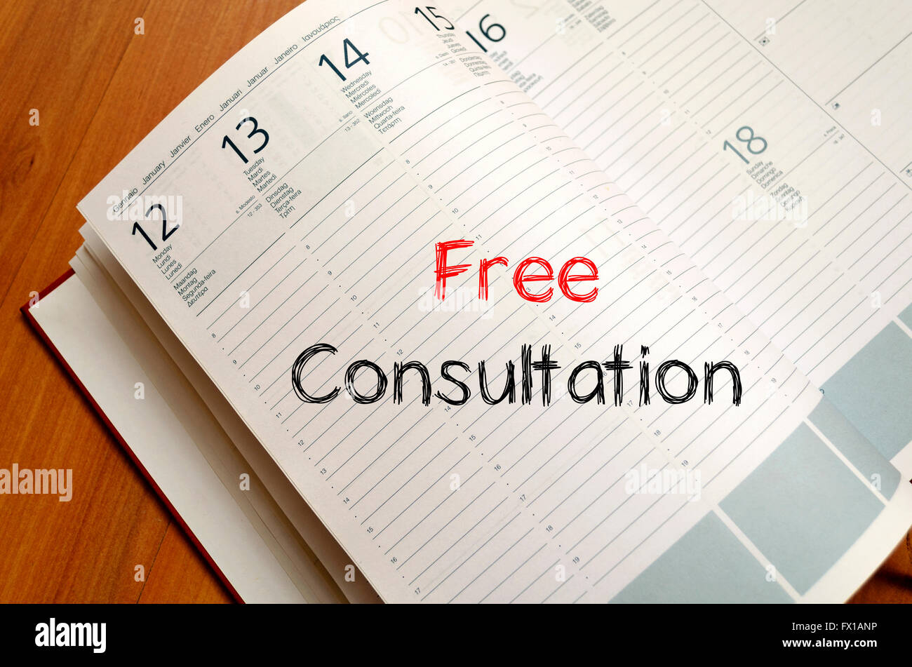 Free consultation text concept write on notebook Stock Photo - Alamy