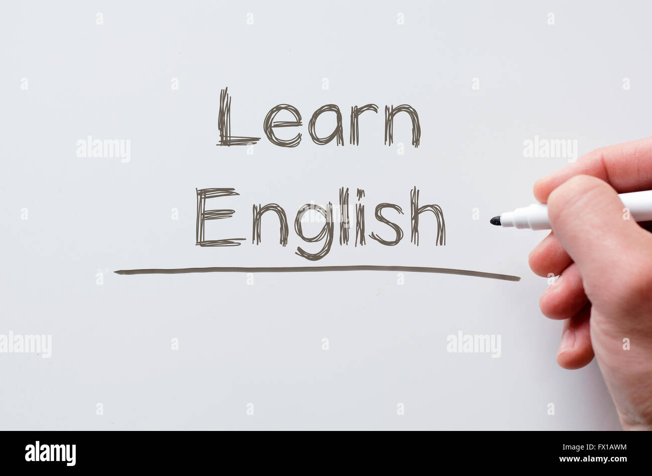 Human hand writing learn english on whiteboard Stock Photo - Alamy