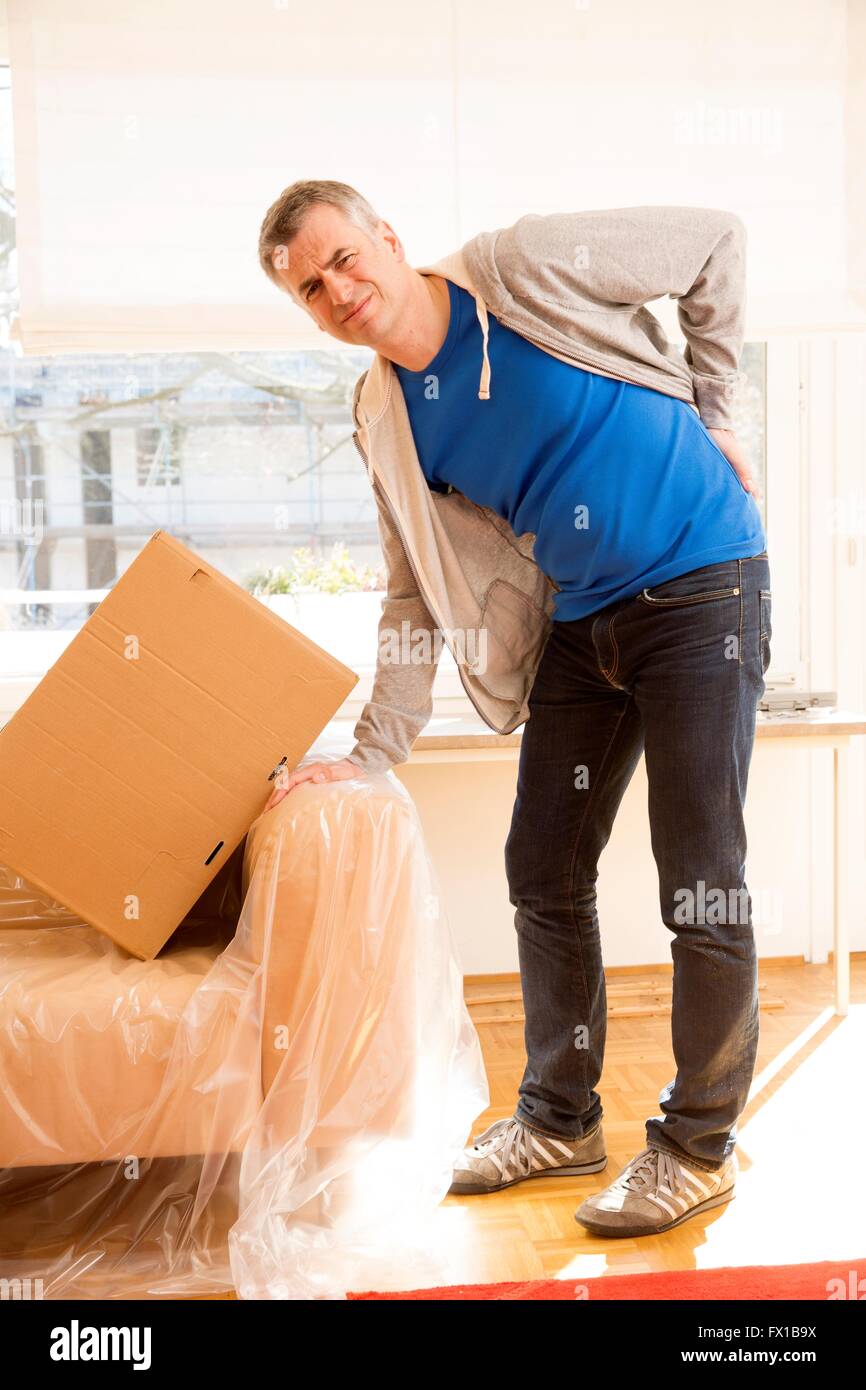 Man dragging heavy load hi-res stock photography and images - Alamy