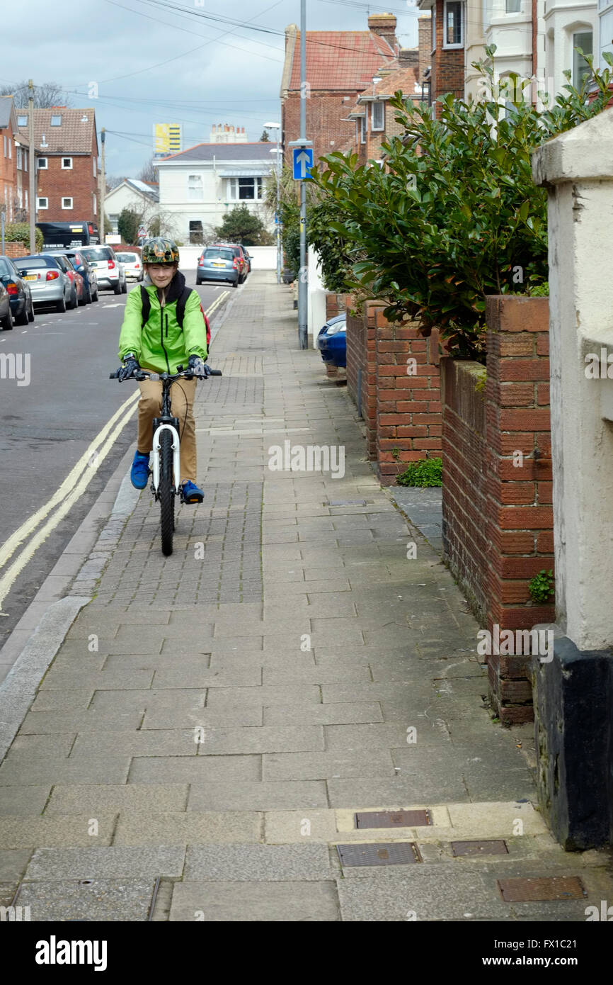 Cyclist riding on pavement hi-res stock photography and images - Alamy