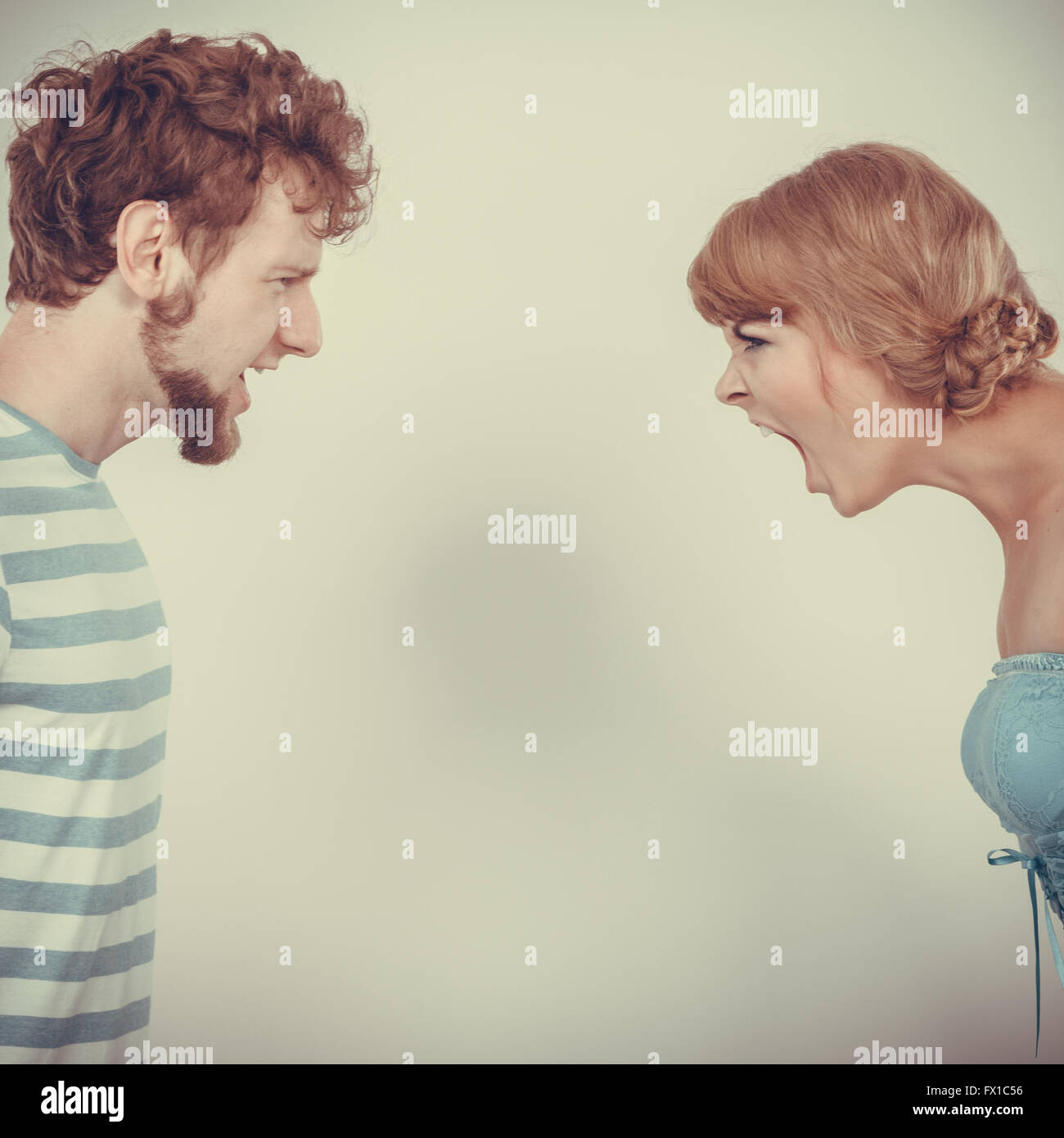 relationship difficulties. Angry woman and man yelling at each other. Face to face Stock Photo ...