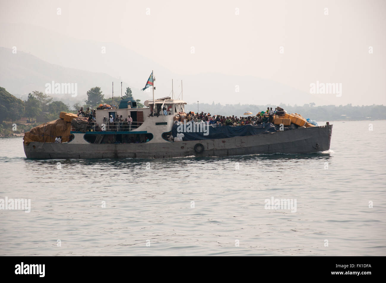 A local ferry departs Uvira, Democratic Republic of the Congo,on the ...