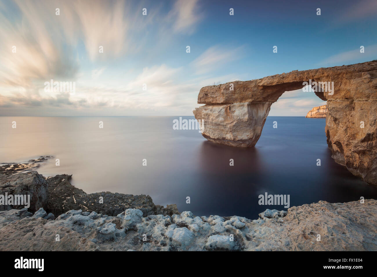 Sunset at Azure Window on the coast of Gozo, Malta, Europe Stock Photo ...