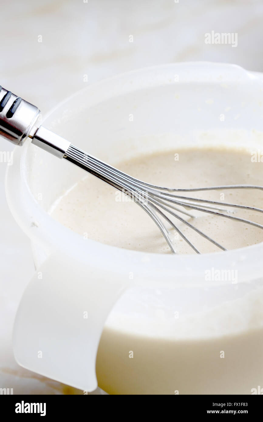 Batter mix whisk Stock Photo - Alamy