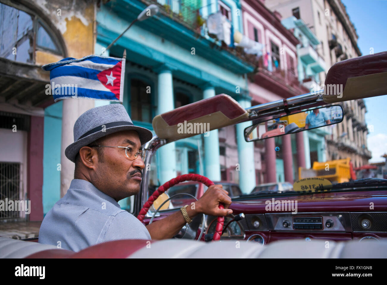 Horizontal view of old Havana from inside a classic American car, Cuba ...