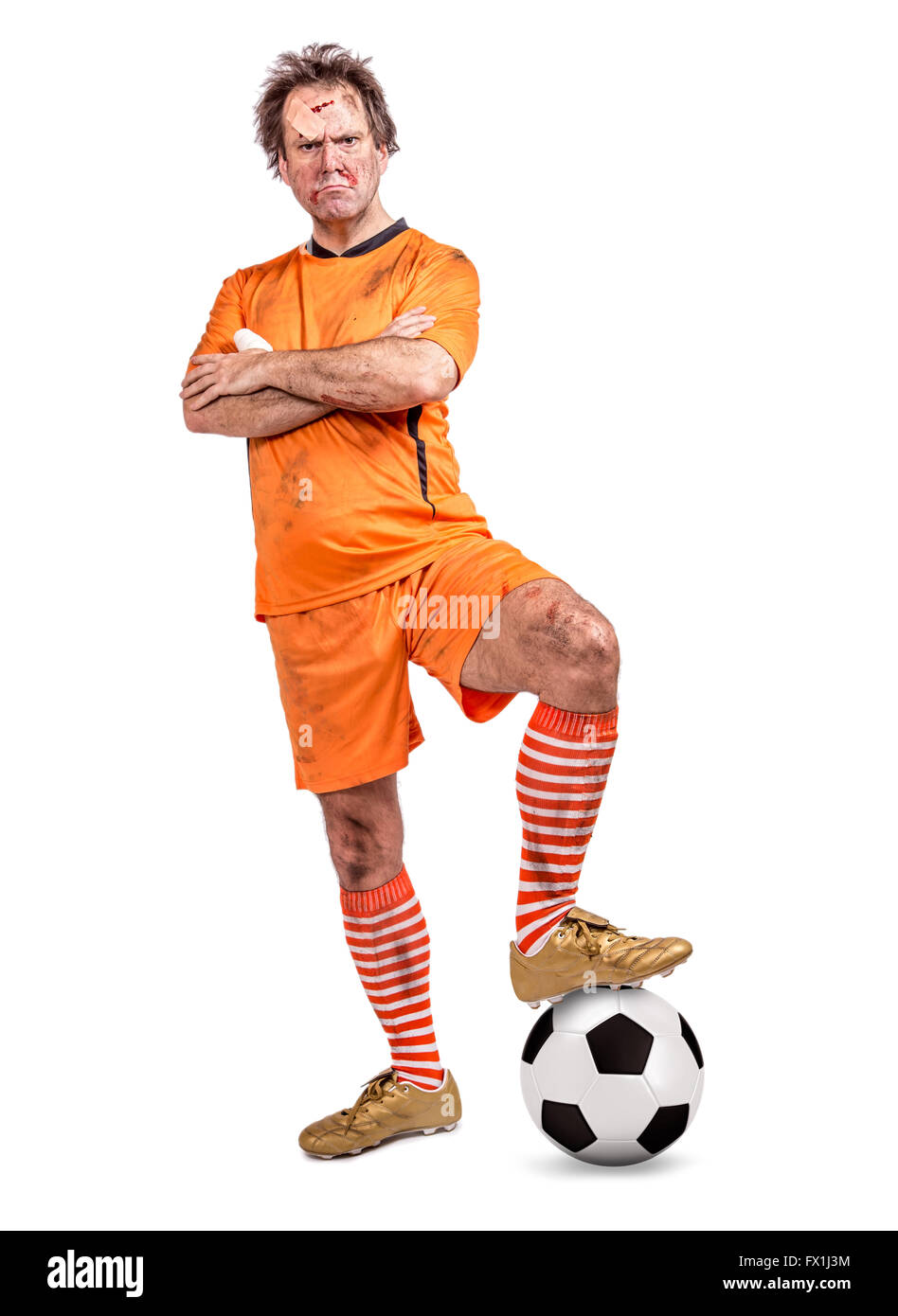 angry football player posing with ball isolated on white background ...