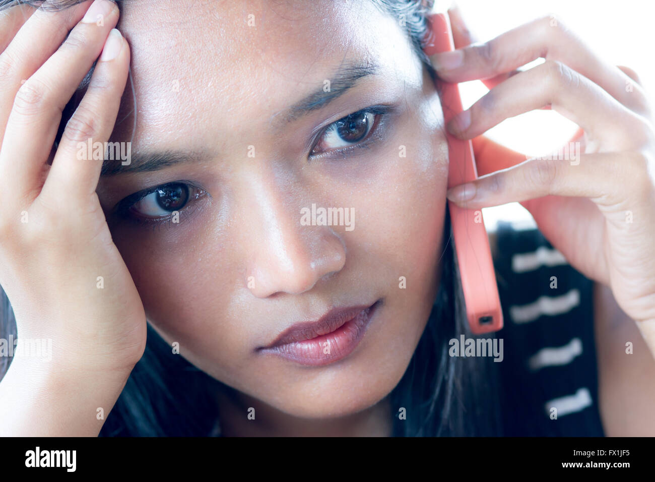 Young woman calling by phone Stock Photo - Alamy
