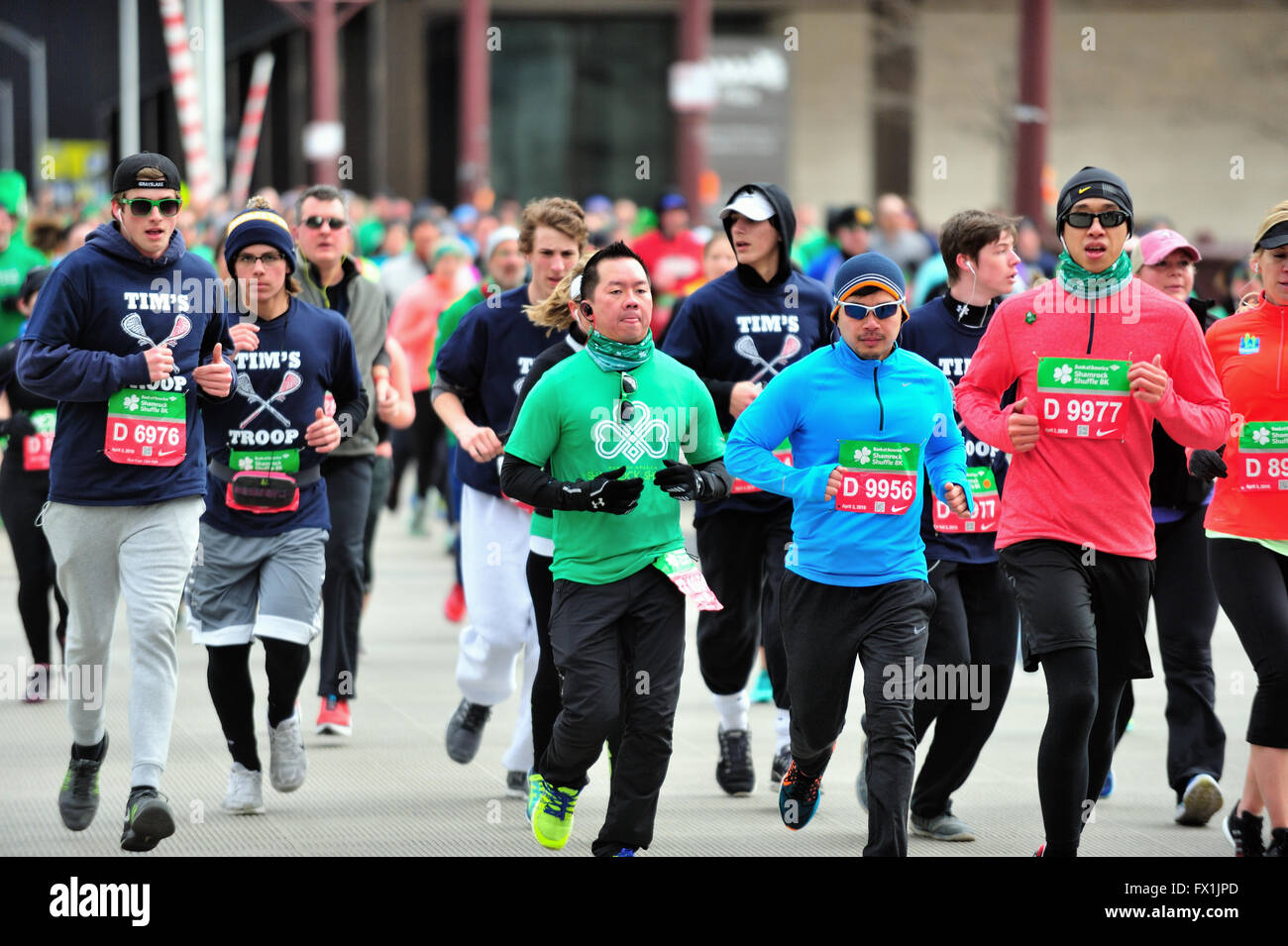 A sea of runners as they cross the State Street Bridge at about the one ...