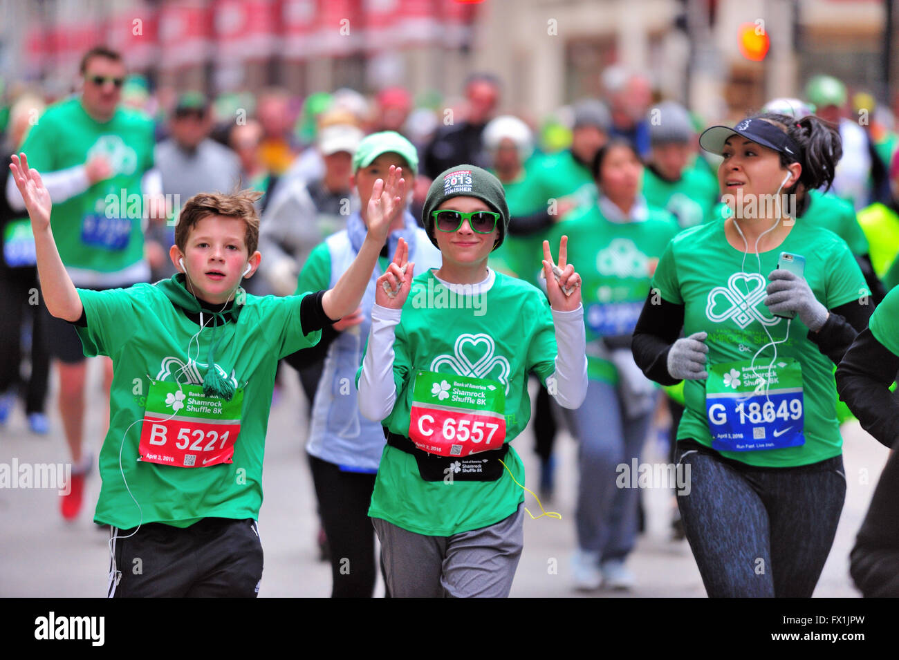 Runners of all ages make their way down LaSalle Street during Chicago's ...