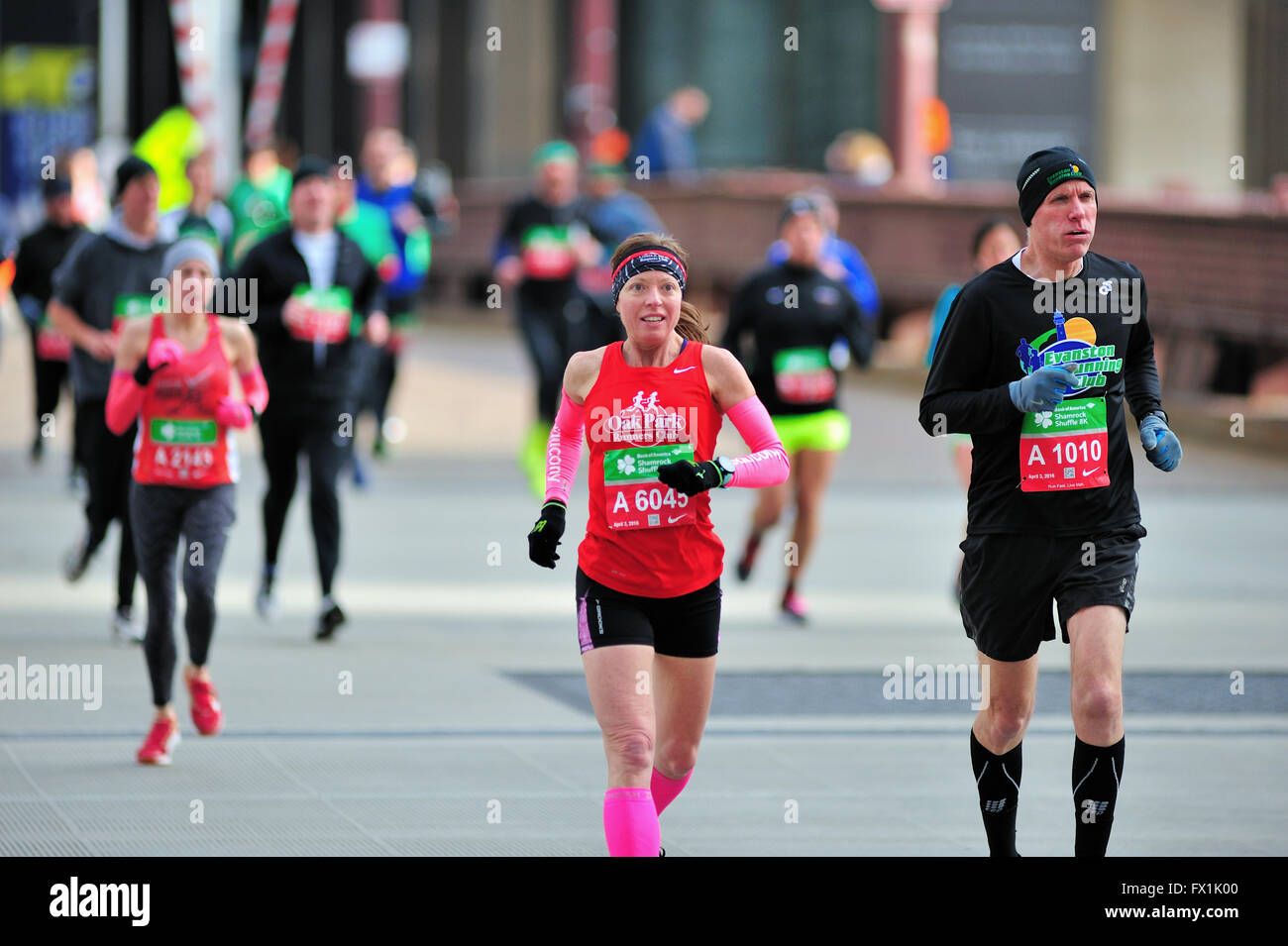 Runners as they cross the State Street Bridge at about the one mile ...