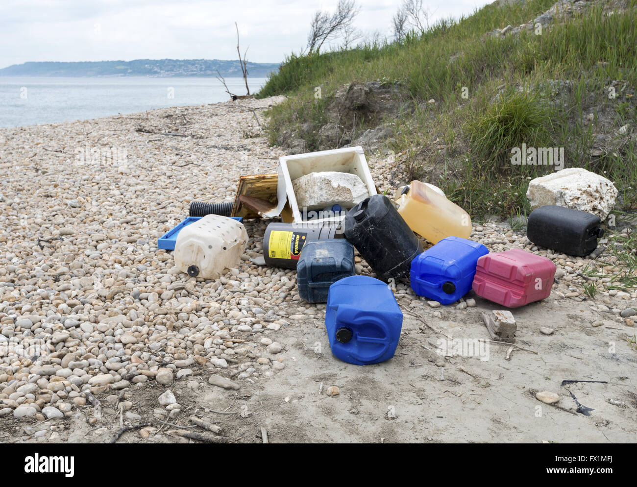Plastic containers washed up on beach hi-res stock photography and ...