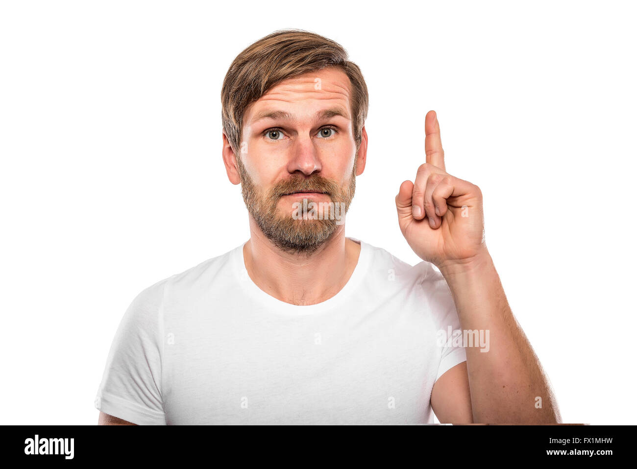 Smiling man points to an empty space.. Isolated on white Stock Photo ...