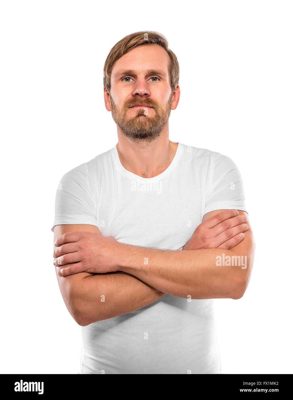 Portrait of a young man with hands folded. Isolated over a white ...