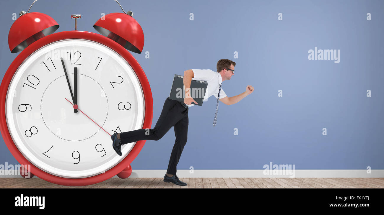 Businessman running on a room Stock Photo - Alamy