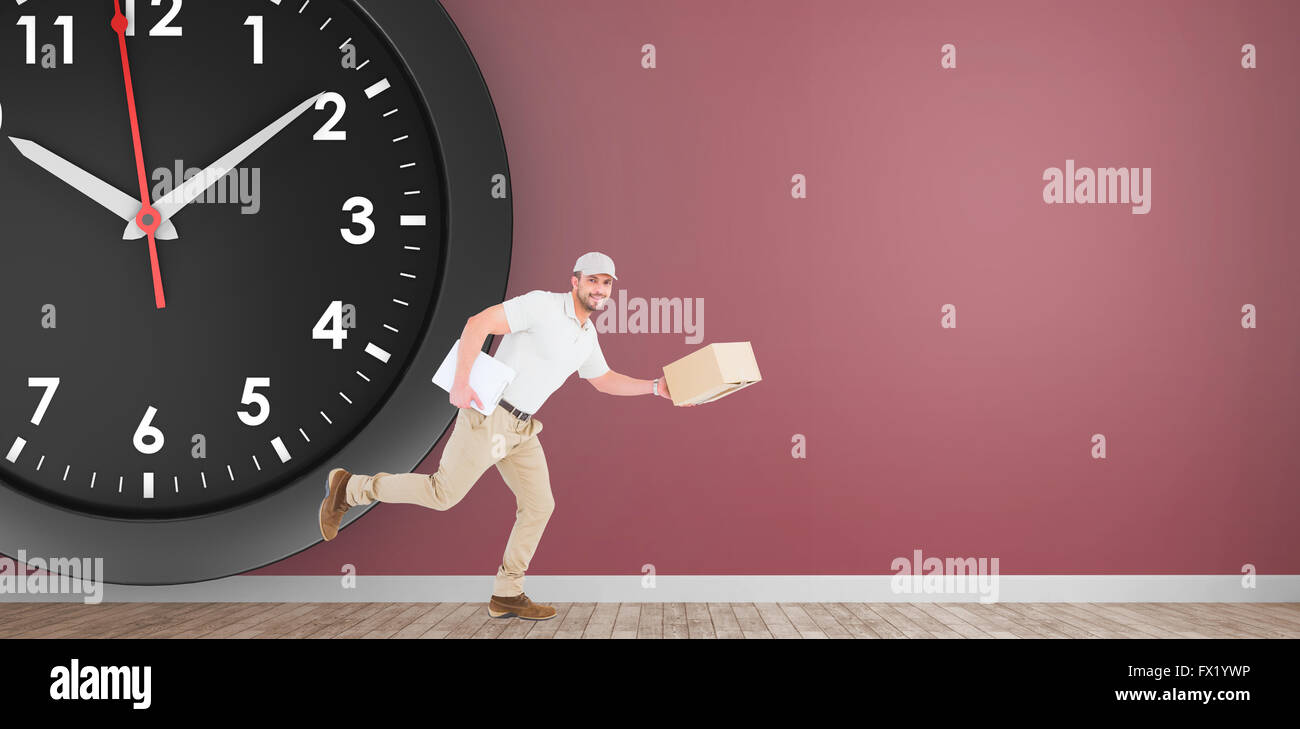 Delivery man with cardboard boxes running Stock Photo - Alamy
