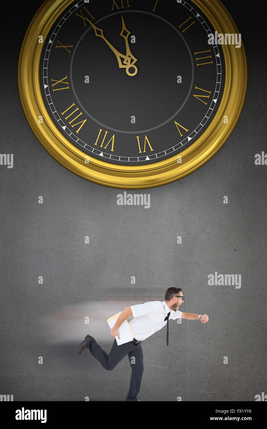 Geeky young businessman running late Stock Photo - Alamy