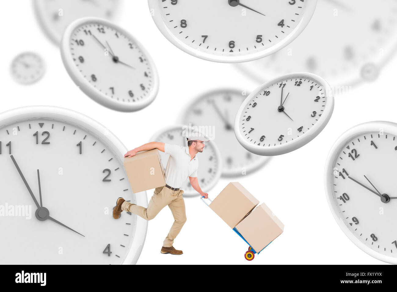 Delivery man with trolley of boxes running Stock Photo - Alamy