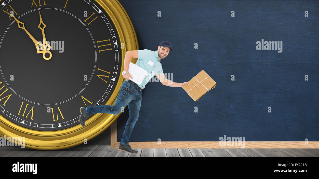 Happy delivery man running with package Stock Photo - Alamy