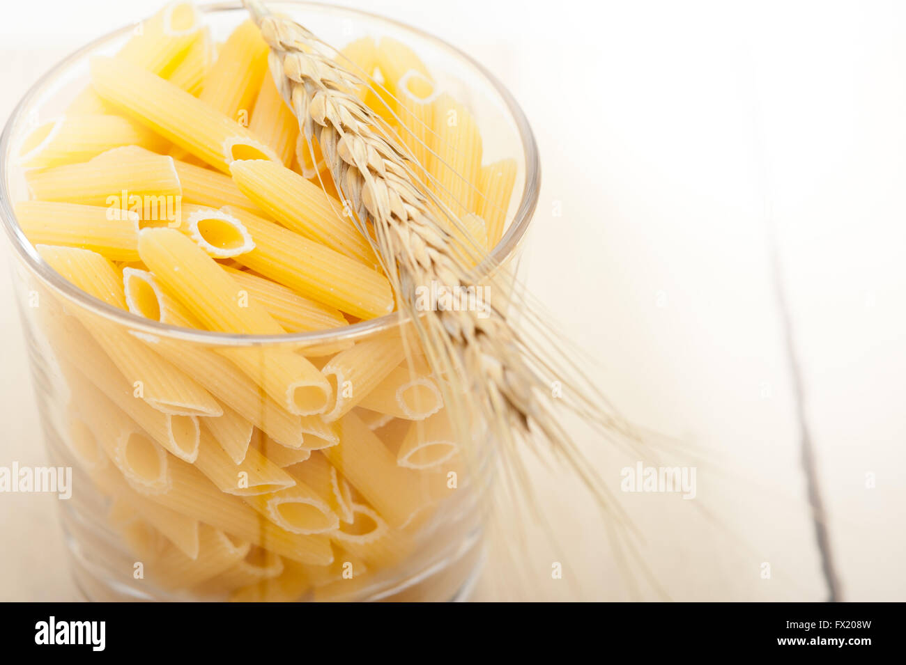 short Italian pasta penne with durum wheat grains Stock Photo - Alamy