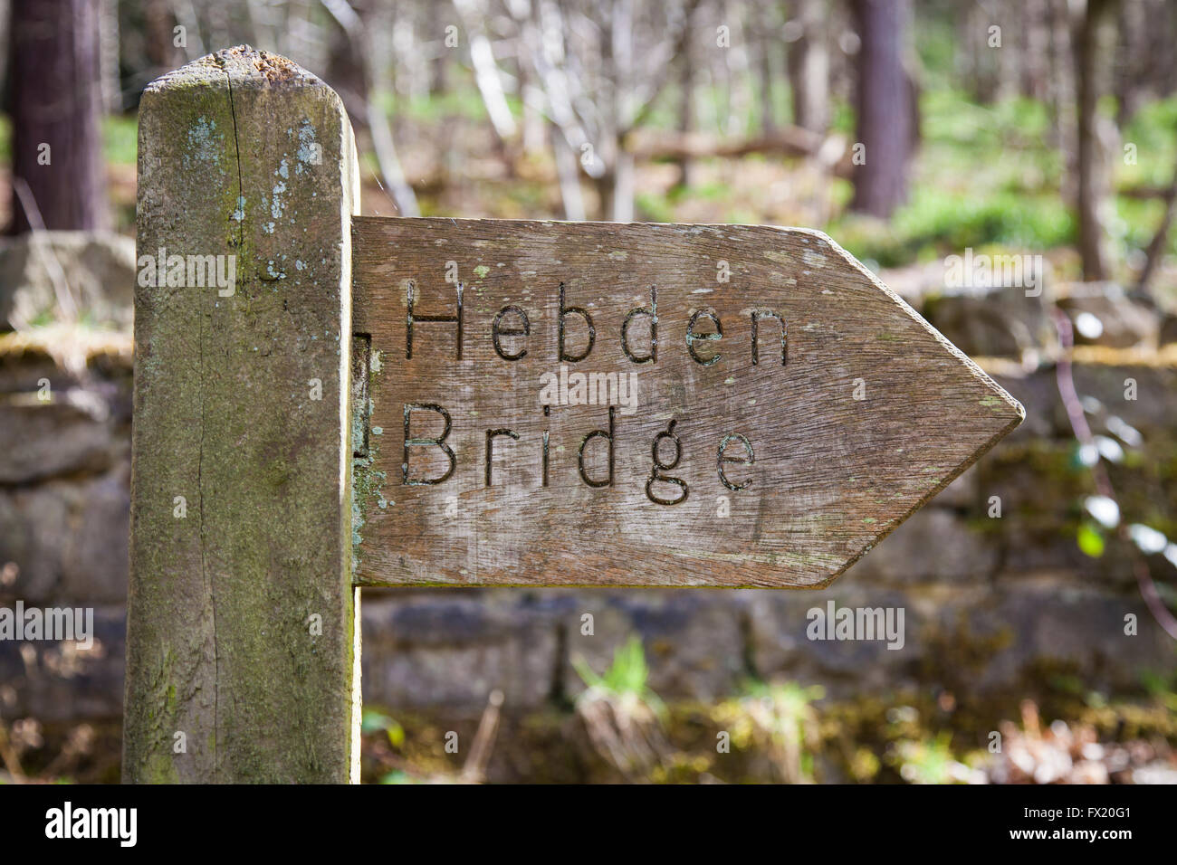 Hebden Bridge wooden signpost Stock Photo - Alamy