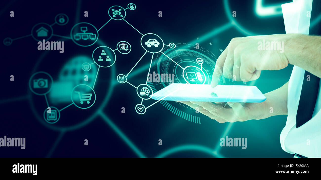 Composite image of businessman scrolling on his tablet pc Stock Photo ...