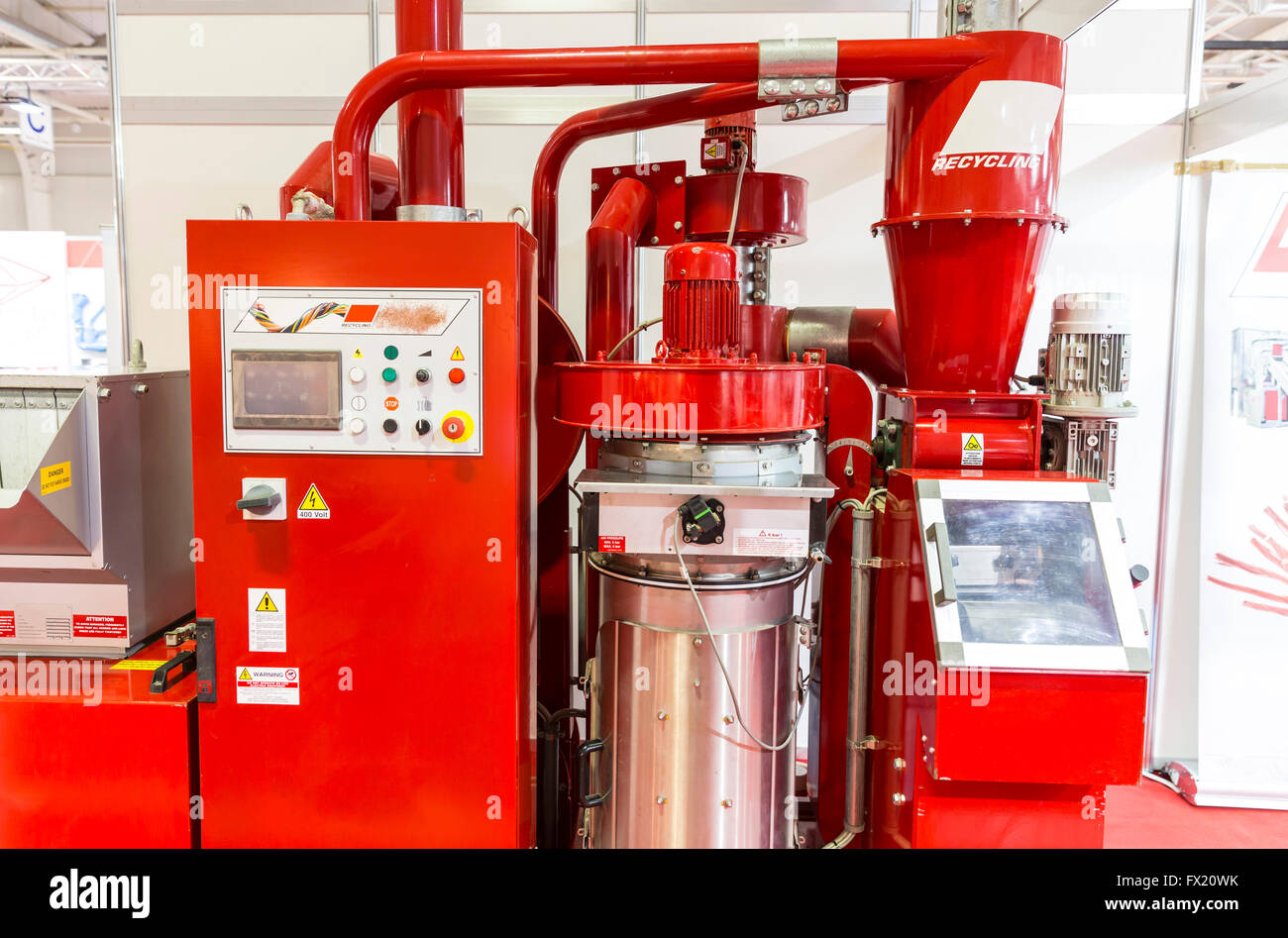 Red recycling machine. Recycles plastic and glass bottles. Control ...