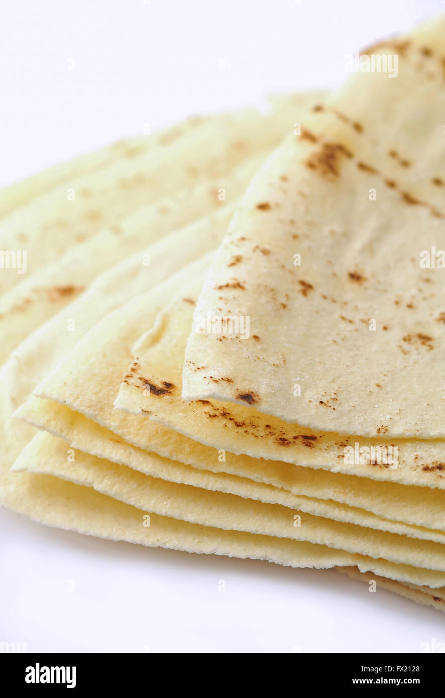 Italian bread carasau isolated on white background Stock Photo - Alamy