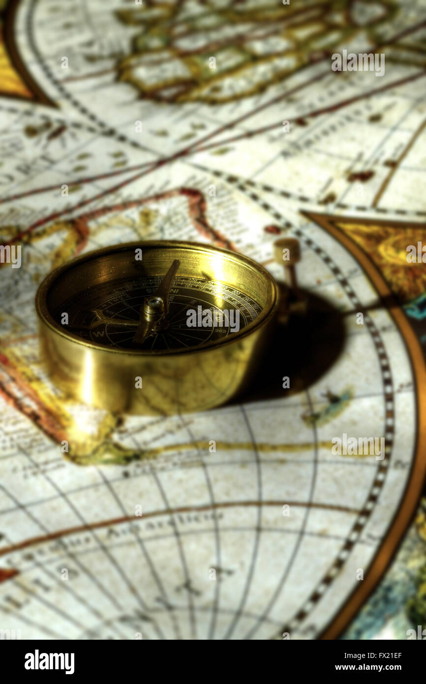 Antique brass compass on map hi-res stock photography and images - Alamy