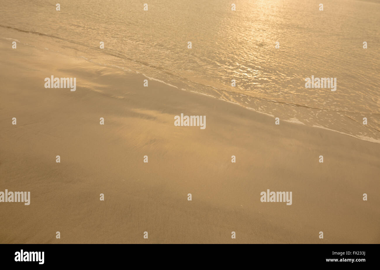 The tide rolling in Stock Photo - Alamy