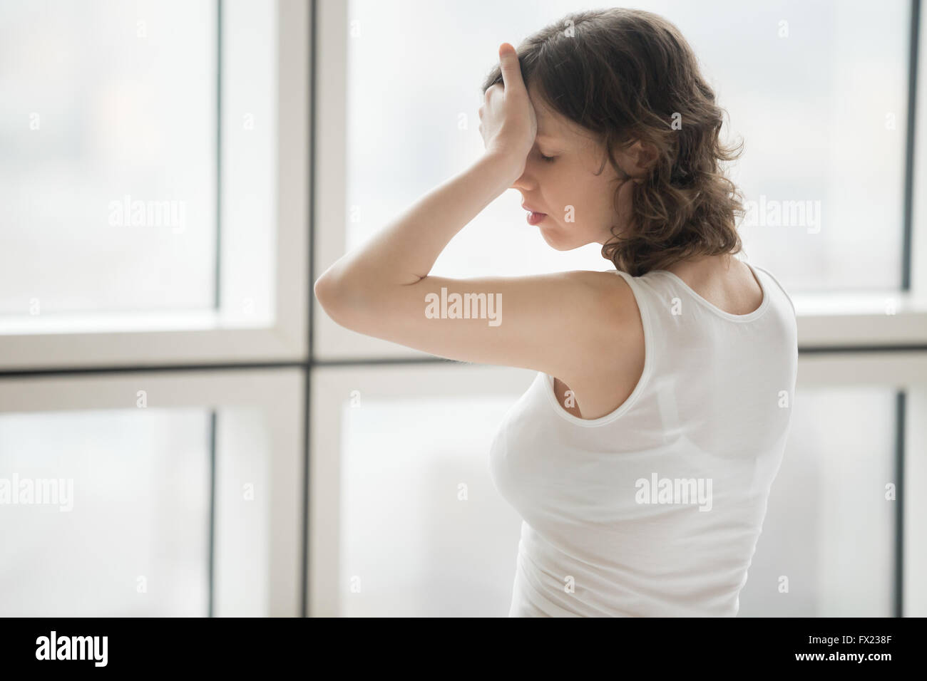Touching his forehead hi-res stock photography and images - Alamy