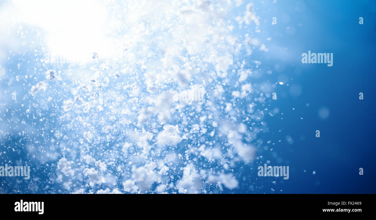 Winter background. Falling snow in blue sky Stock Photo - Alamy
