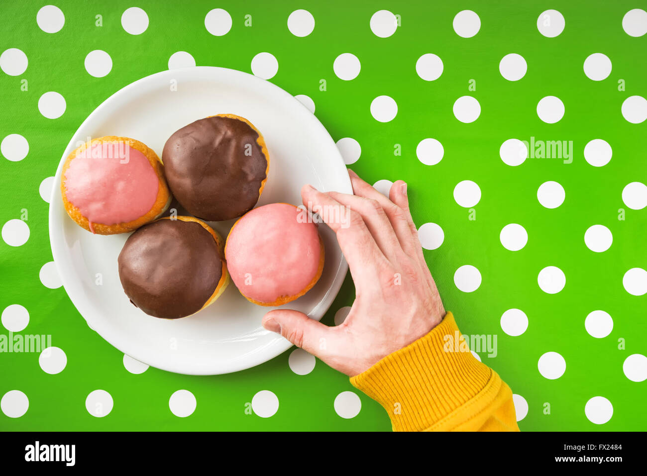 Donuts doughnuts food man hi-res stock photography and images - Alamy