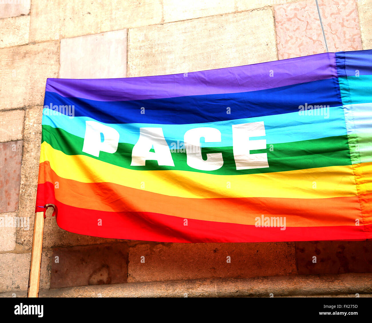 rainbow Peace flag with big written PACE in italy 1 Stock Photo - Alamy