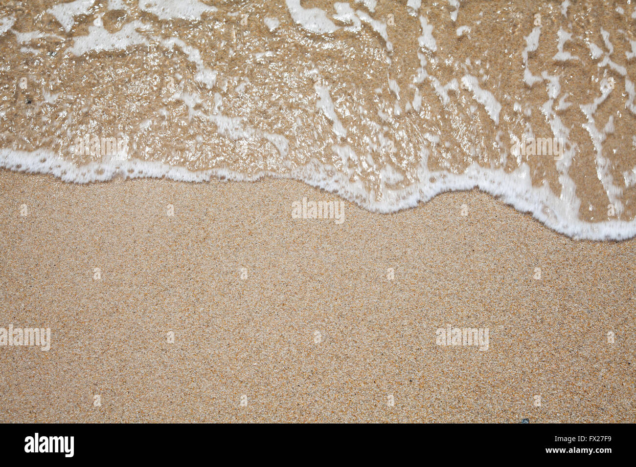 sand and wave background Stock Photo - Alamy