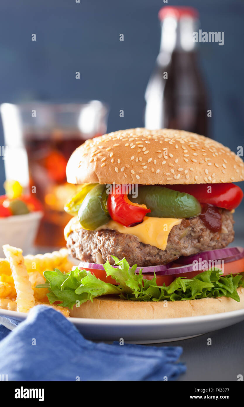 homemade cheese burger with peppers tomato onion Stock Photo - Alamy