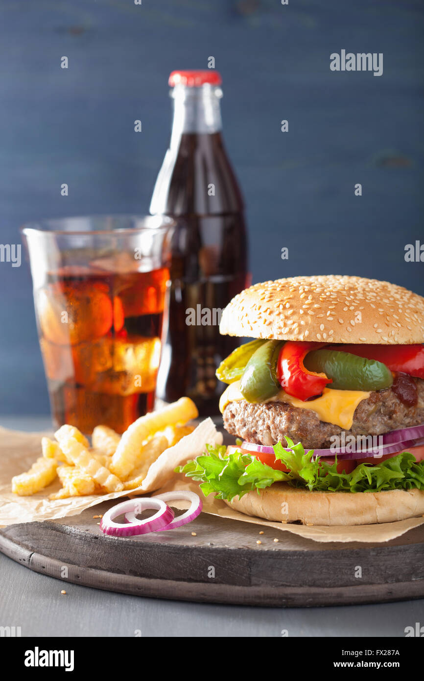 homemade cheese burger with peppers tomato onion Stock Photo - Alamy
